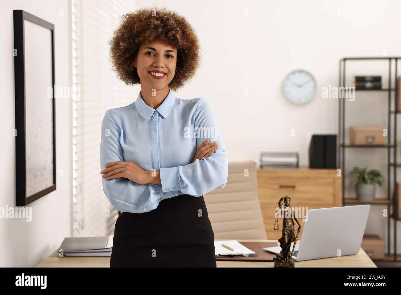 Portrait of beautiful female notary in office Stock Photo - Alamy