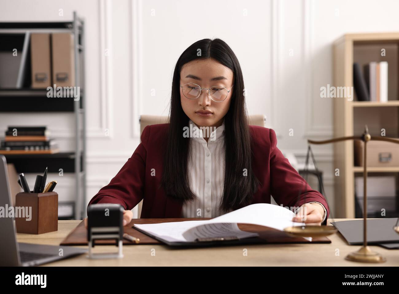 Judge reading legal document hi-res stock photography and images - Alamy