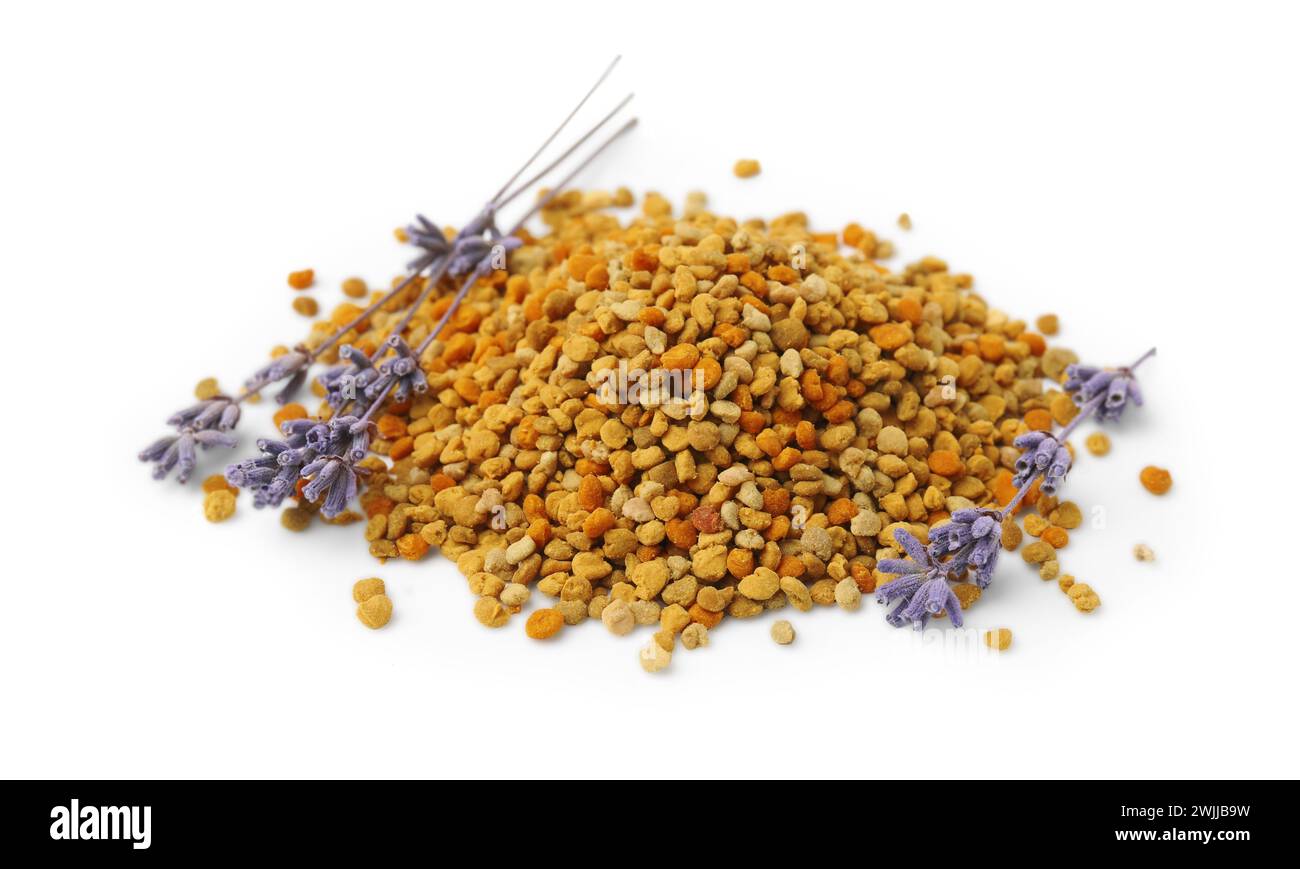 Pile of fresh bee pollen granules and lavender isolated on white Stock ...