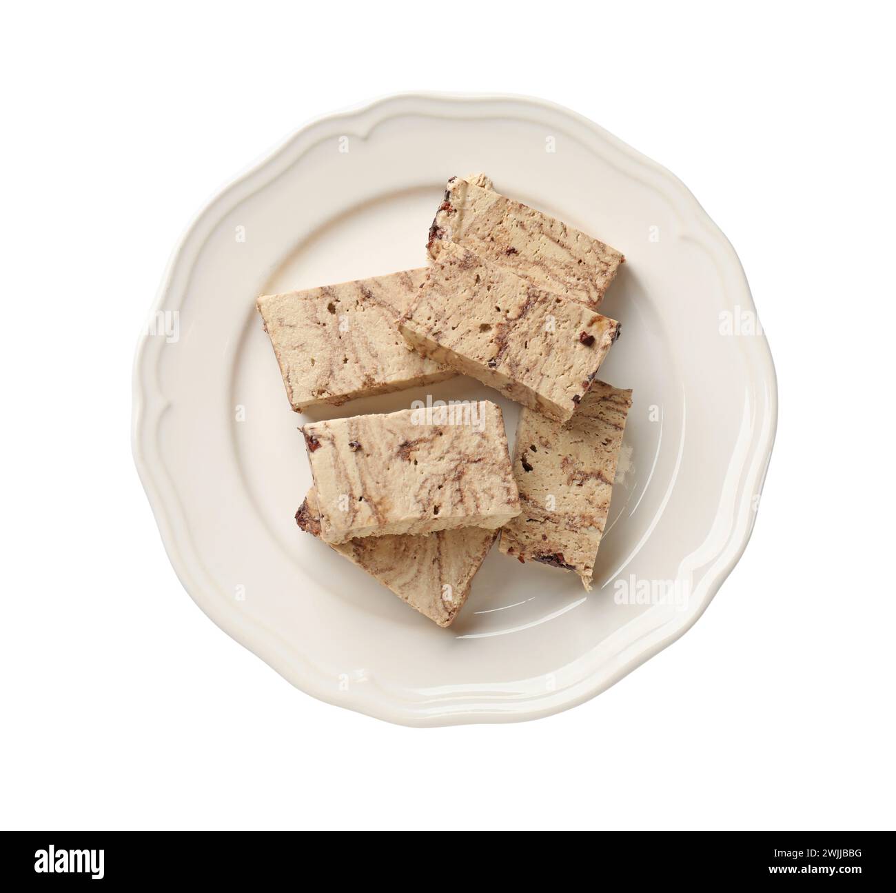 Pieces of tasty chocolate halva isolated on white, top view Stock Photo - Alamy