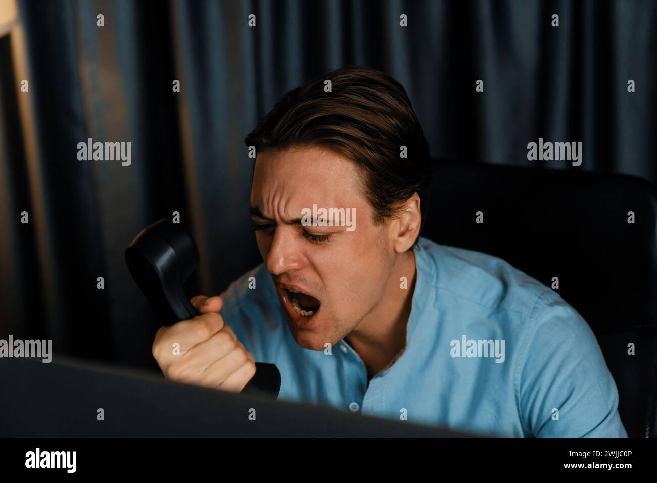 Smart businessman calling with telephone office argument shouting over ...