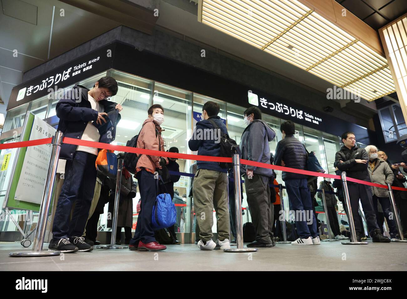 People line up at a ticket office called Green Window to buy Hokuriku ...