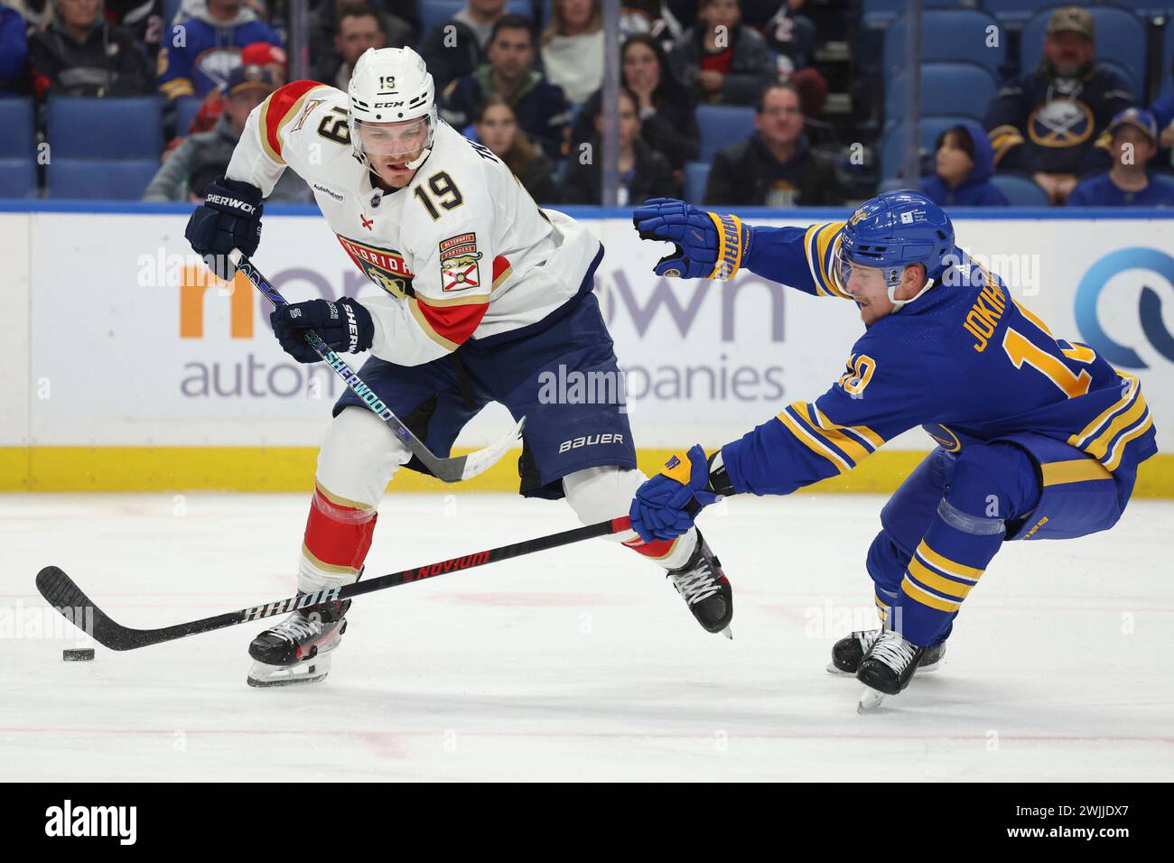 Buffalo Sabres defenseman Henri Jokiharju (10) stick-checks Florida ...
