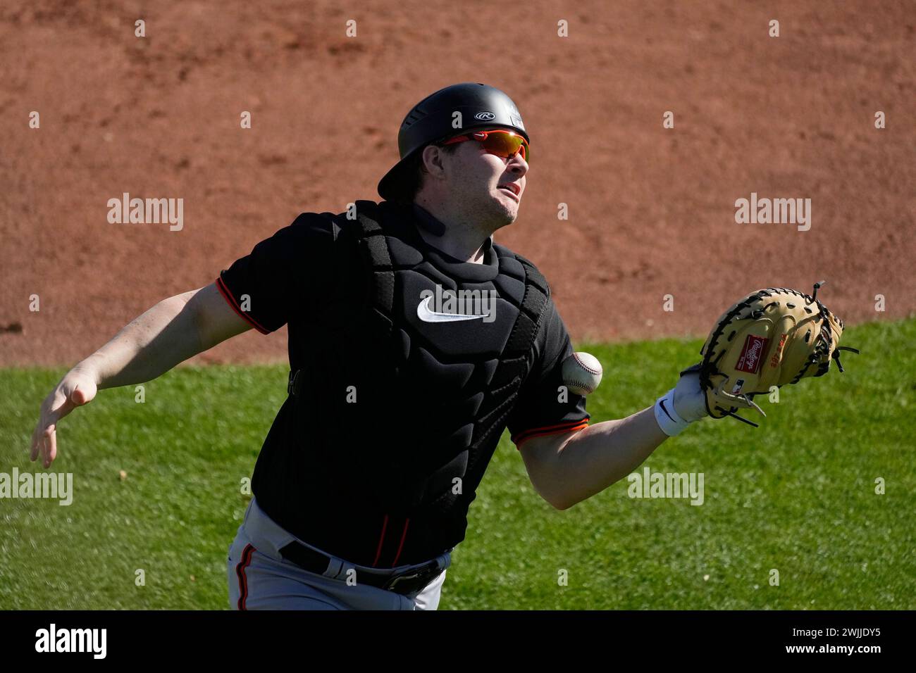 San Francisco Giants catcher Patrick Bailey reaches out to make a cach ...
