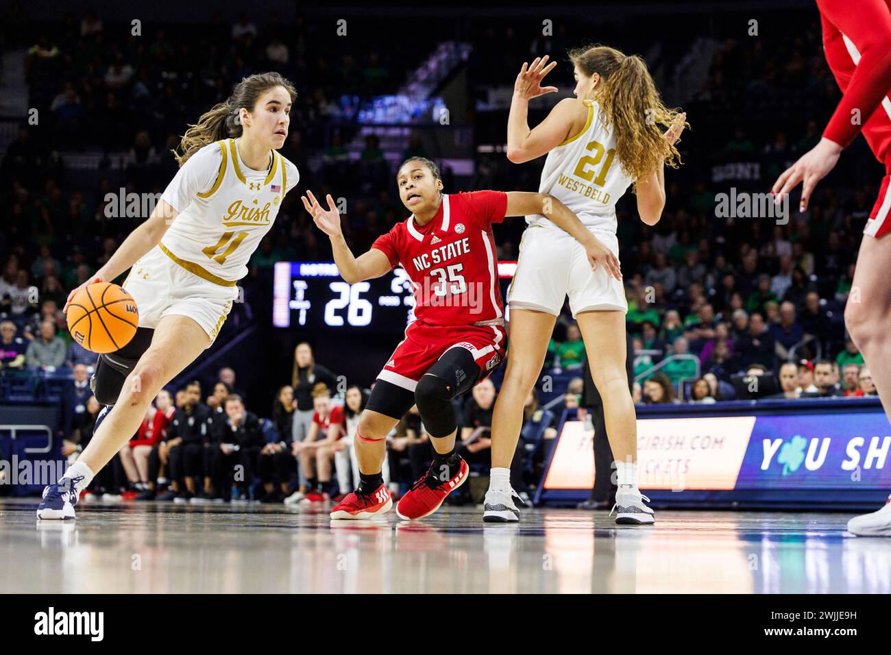 February 15, 2024: Notre Dame guard Sonia Citron (11) dribbles around a screen by Notre Dame ...
