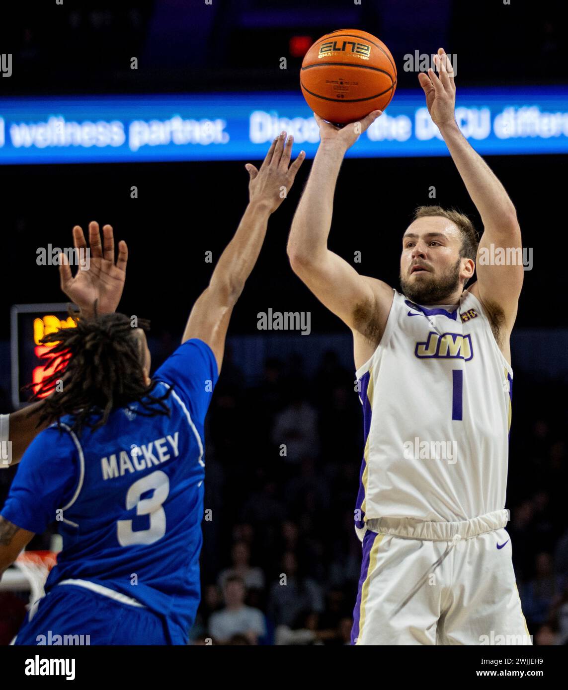 James Madison guard Noah Freidel (1) shoots over Georgia State guard ...