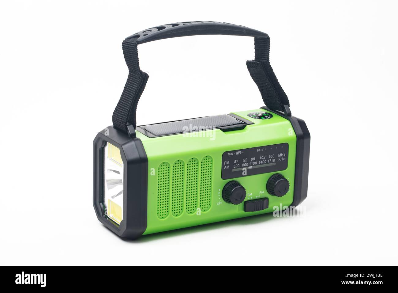 Emergency radio with flashlight rechargeable using built-in hand crank ...