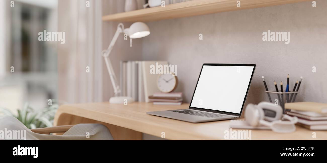 A minimal Scandinavian beige home office workspace with a white-screen ...