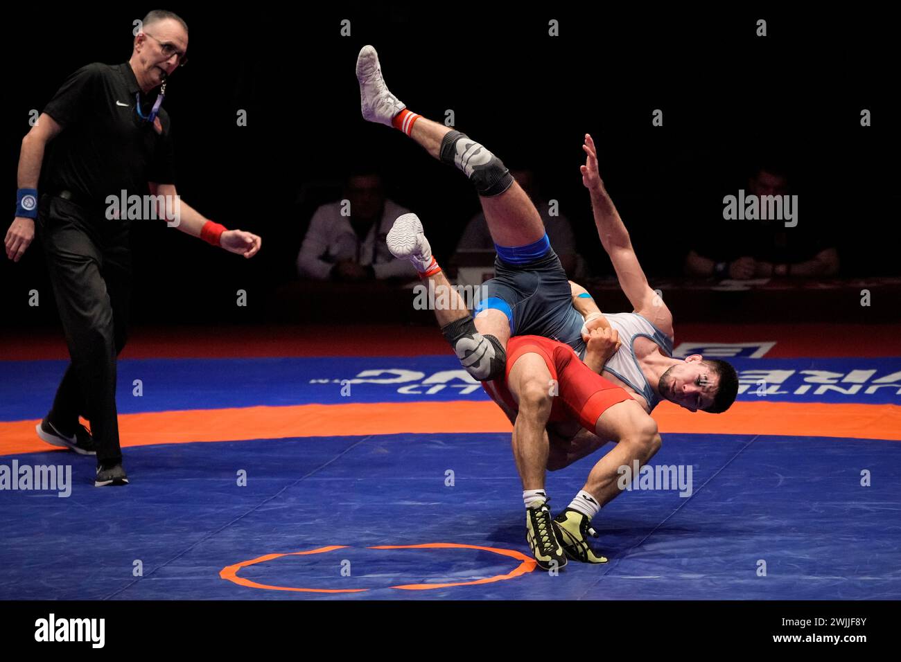 Azerbaijan's Hasrat Jafarov, bottom, competes against Individual ...