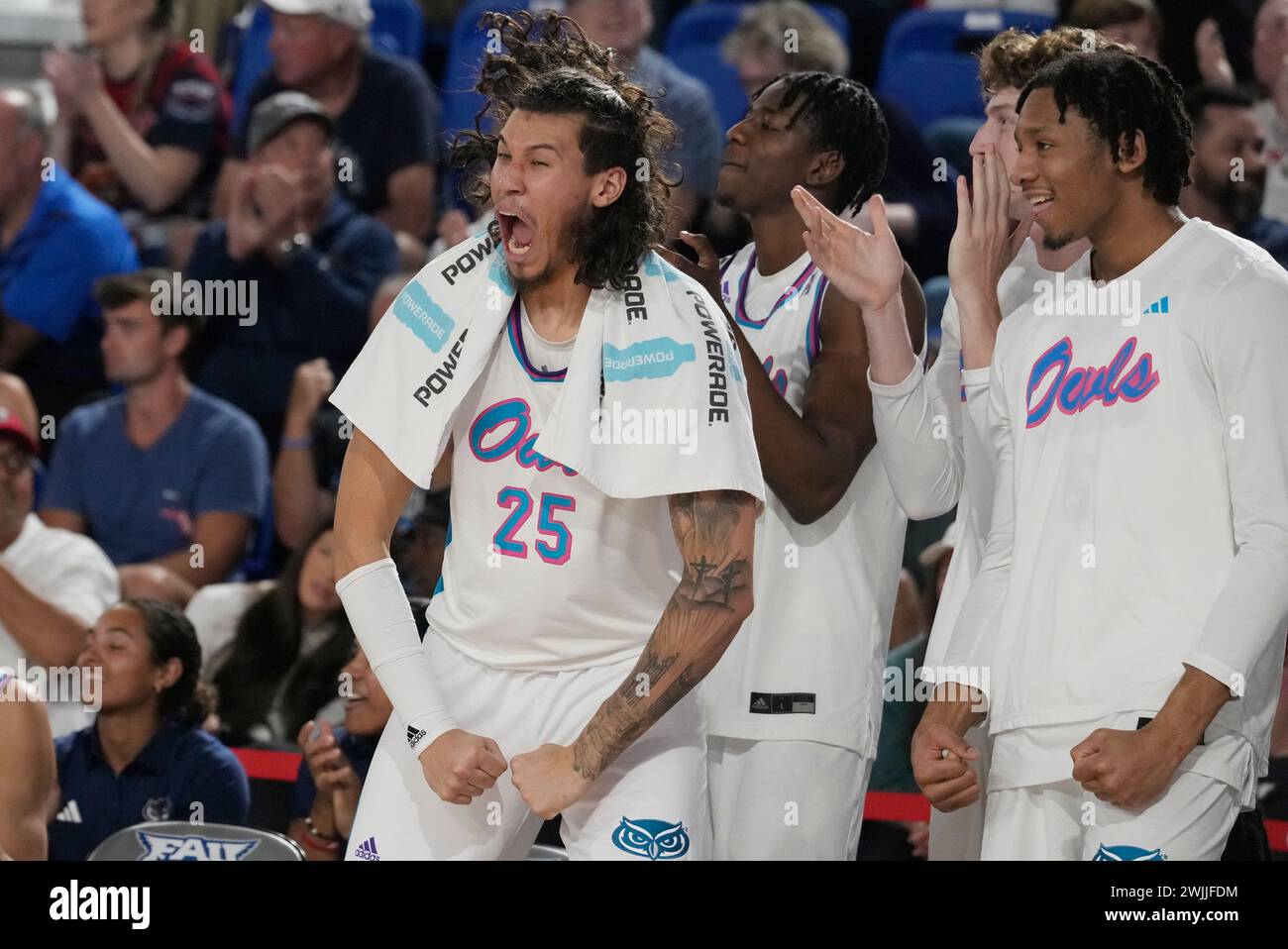Florida Atlantic forward Tre Carroll (25) cheers the team during the ...