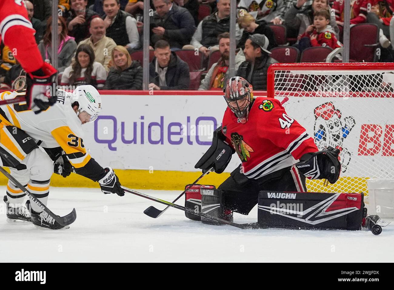 Chicago Blackhawks goaltender Arvid Soderblom makes a save against ...