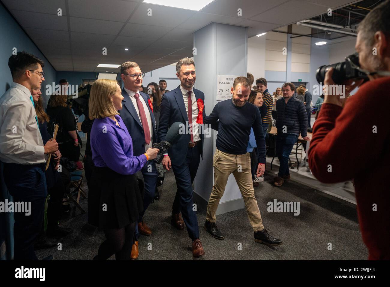 Labour candidate Damien Egan walks with his husband Yossi Felberbaum ...
