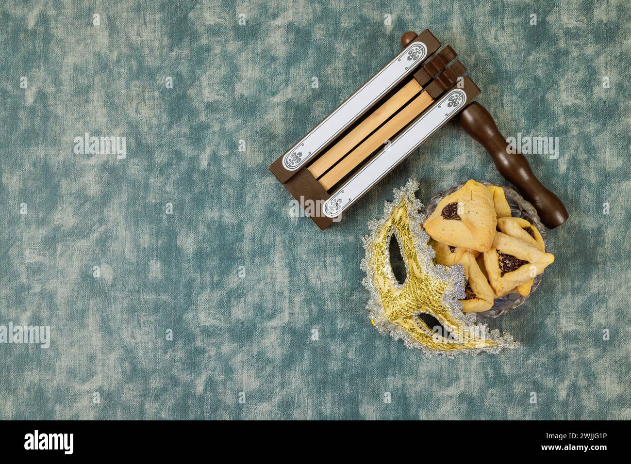 Jewish holiday of Purim is celebrated with rattles, carnival masks ...