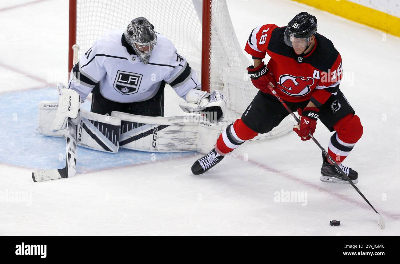 Los Angeles Kings goalie David Rittich, left, watches New Jersey Devils ...