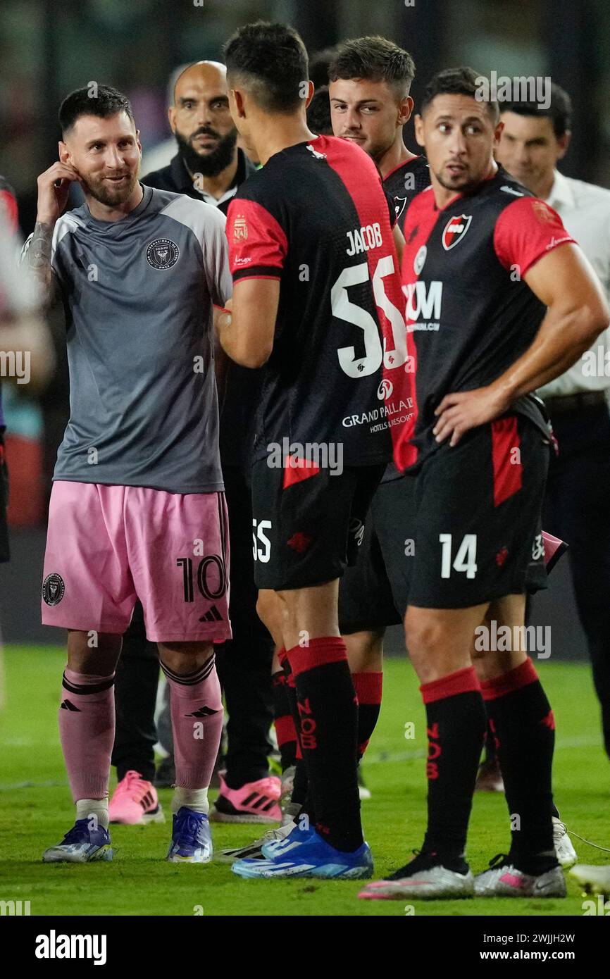Inter Miami forward Lionel Messi (10) talks with Newell's Old Boys ...