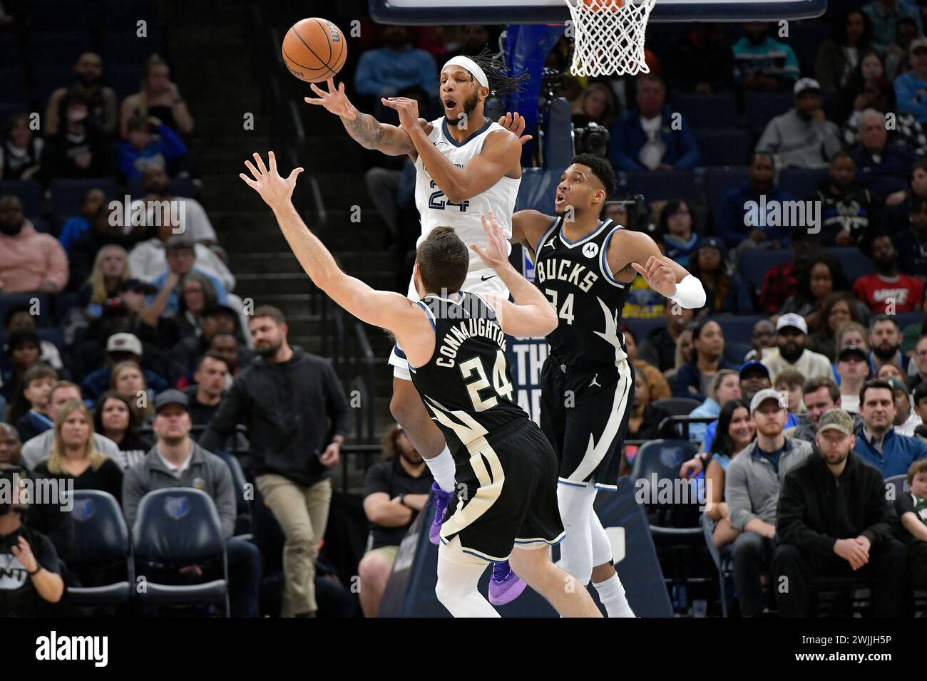 Memphis Grizzlies forward Lamar Stevens (24) passes the ball between ...