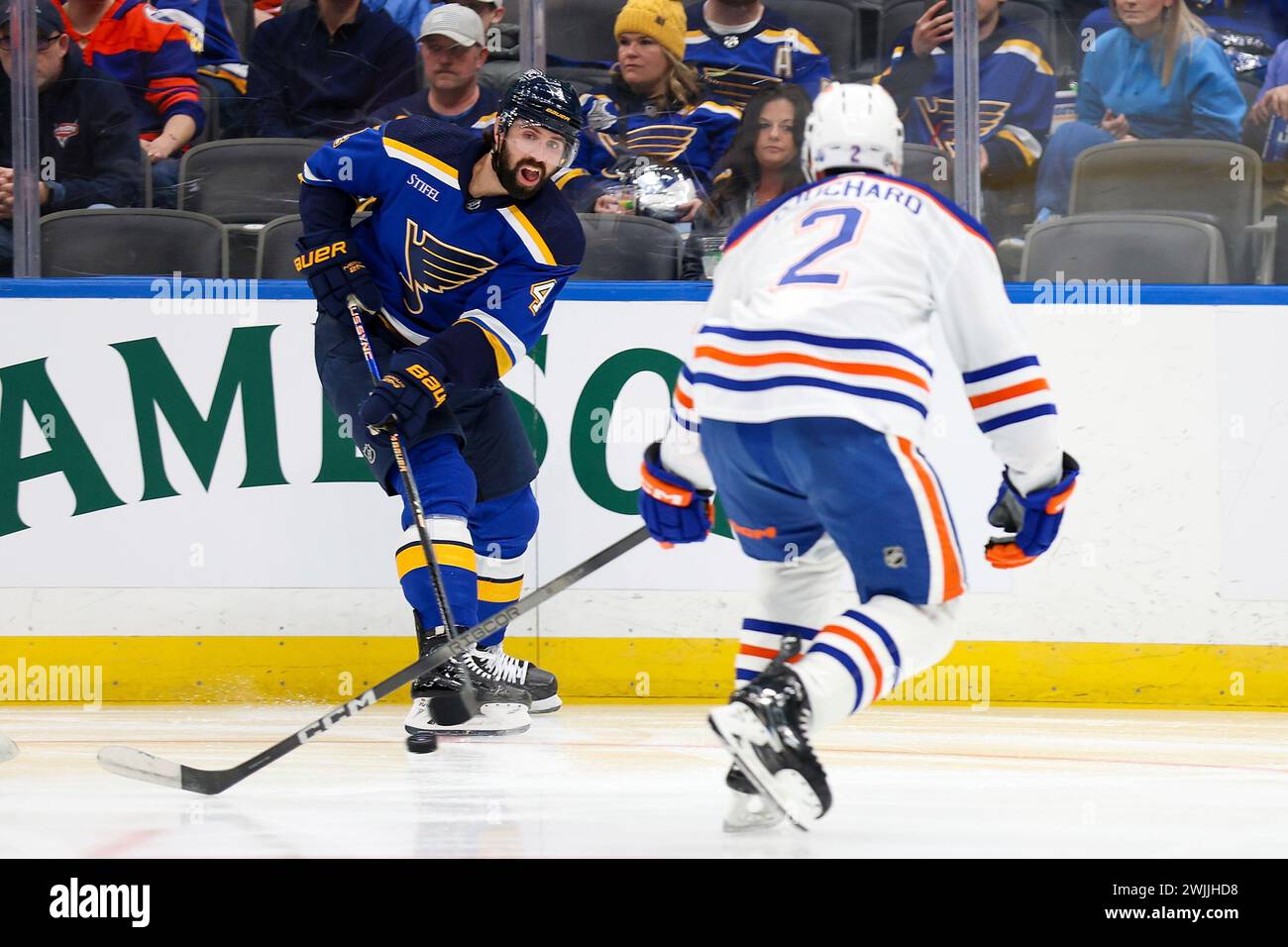 St. Louis Blues' Nick Leddy (4) passes the puck while under pressure ...