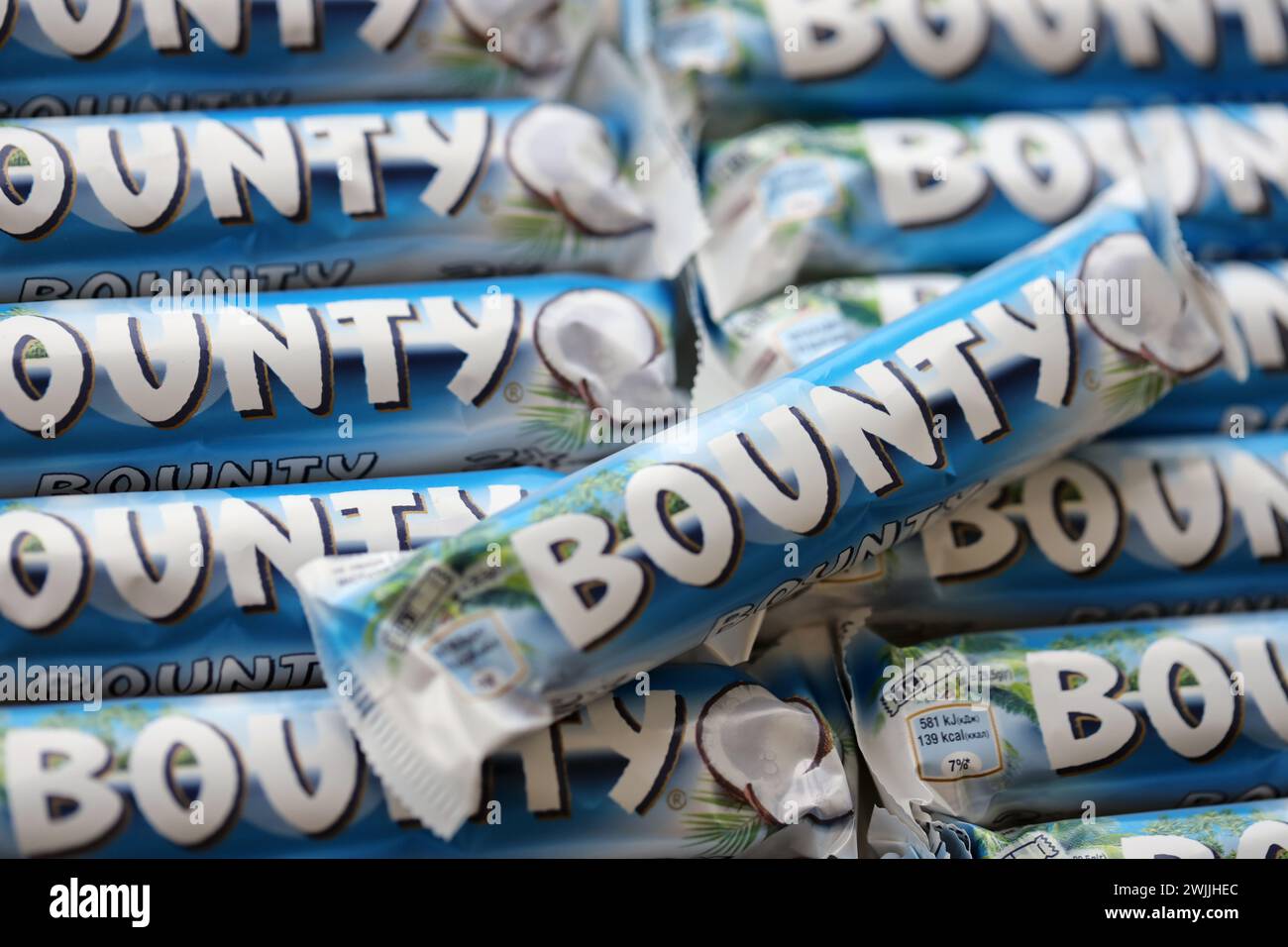 KYIV, UKRAINE - OCTOBER 31, 2023 Bounty chocolate bars with cocoa ...