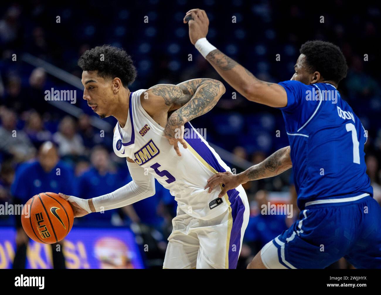 James Madison guard Terrence Edwards Jr. (5) drives around Georgia ...