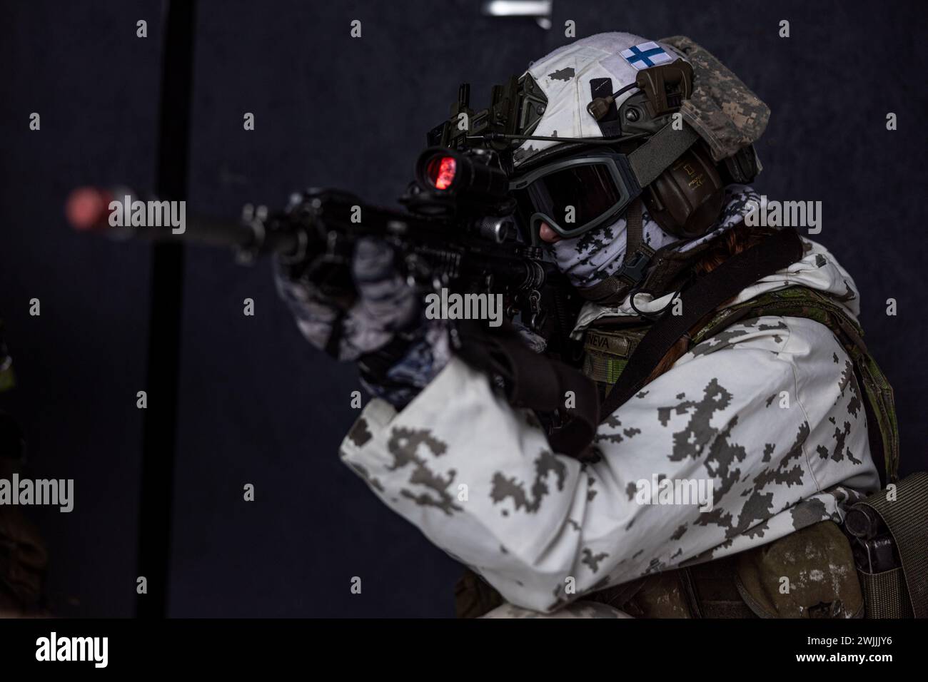 A Finnish Soldier with Finnish Defense Forces, provides security during ...