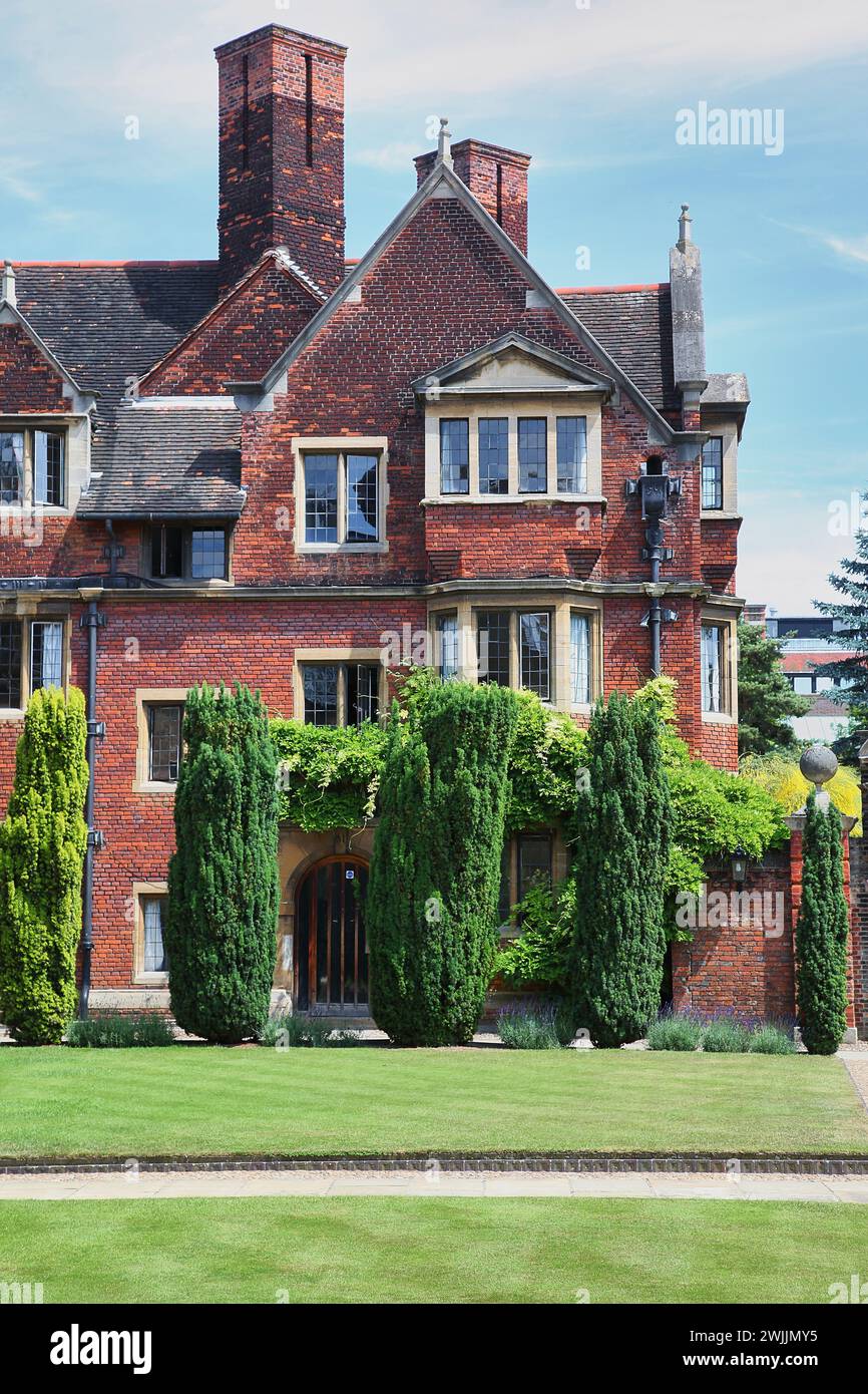 The view of the old red brick building and the gate at the east range ...