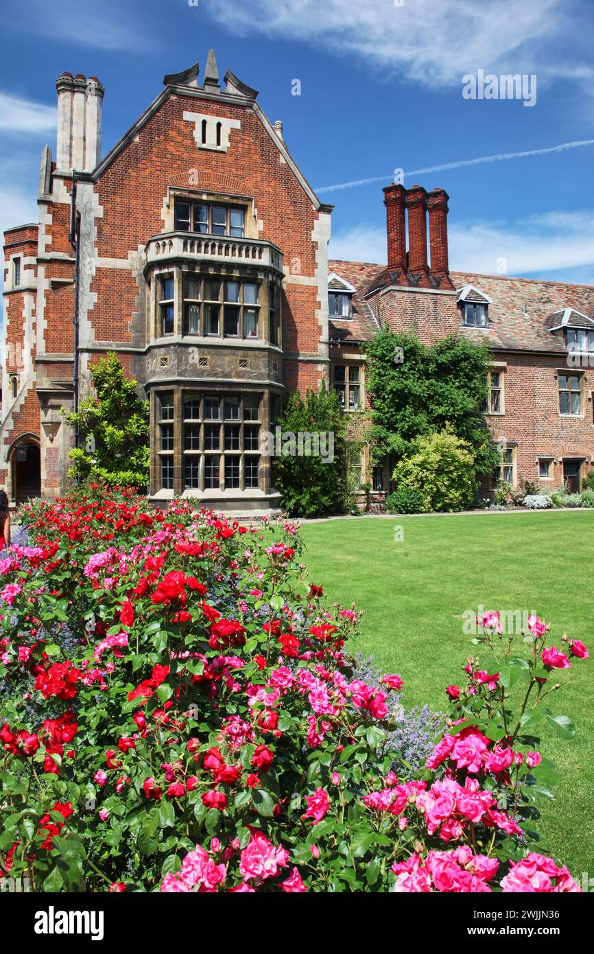 The well manicured green grass and flower beds at library lawn in front ...
