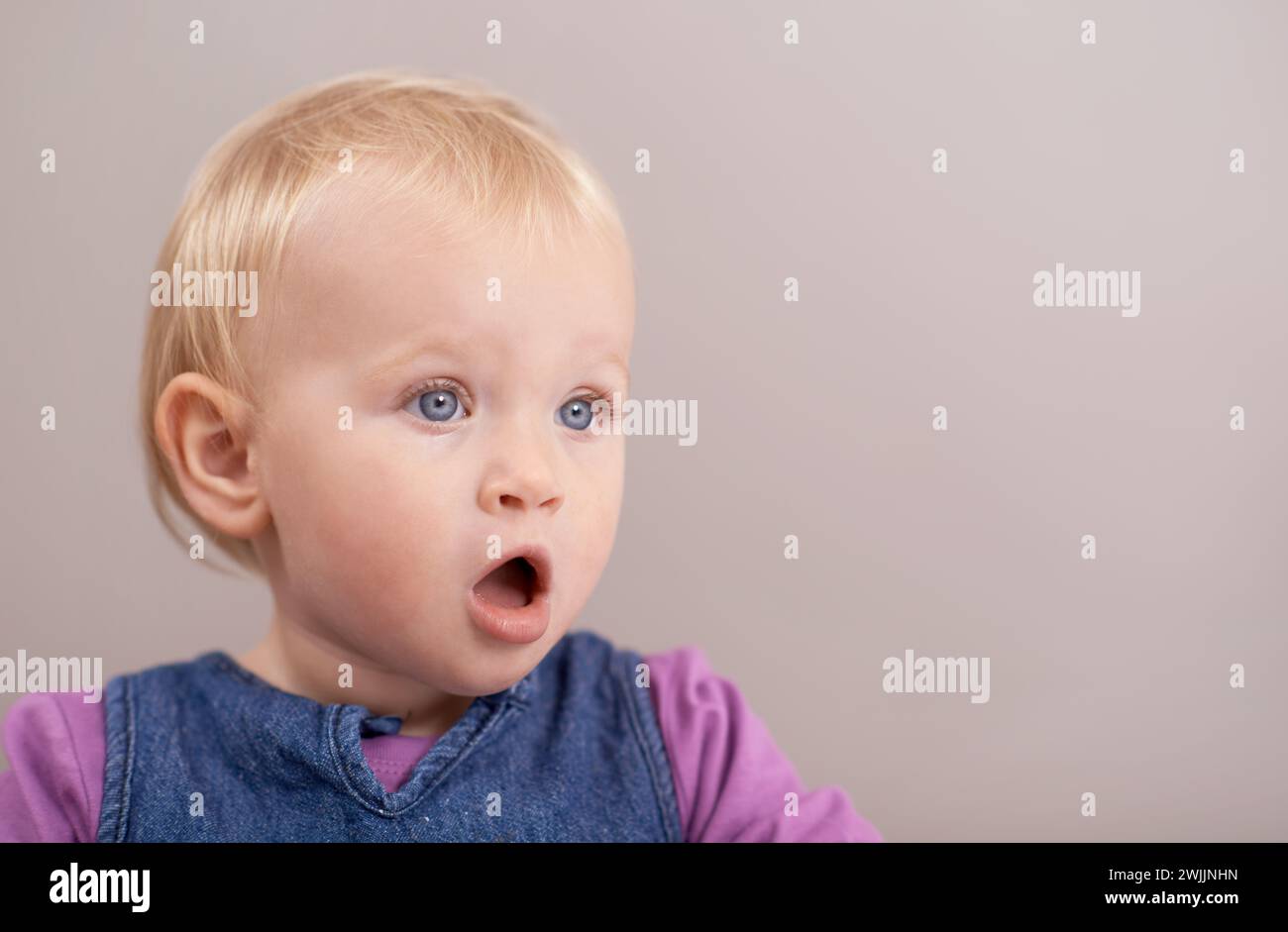 Children, wow and baby in studio with surprise, announcement or open ...