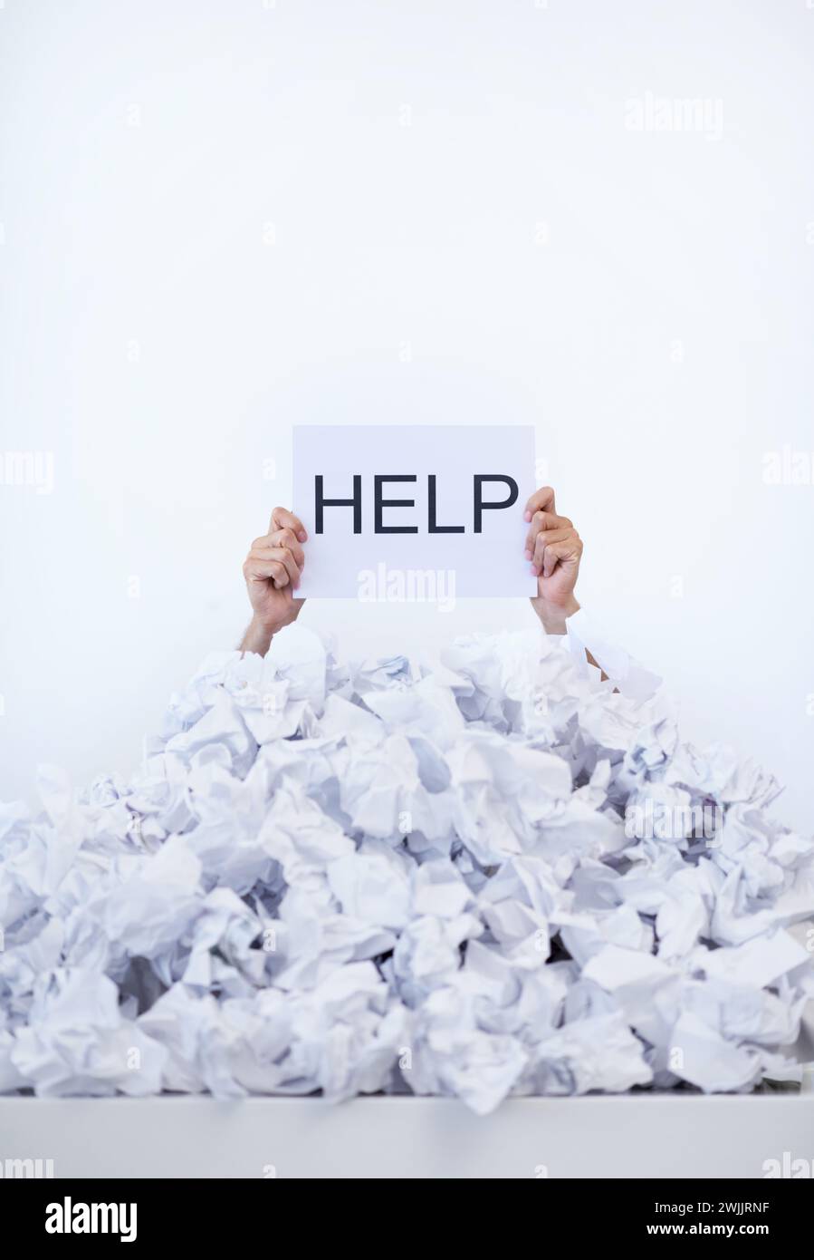 Person, desk and hands with pile of paperwork, sign and help with ...