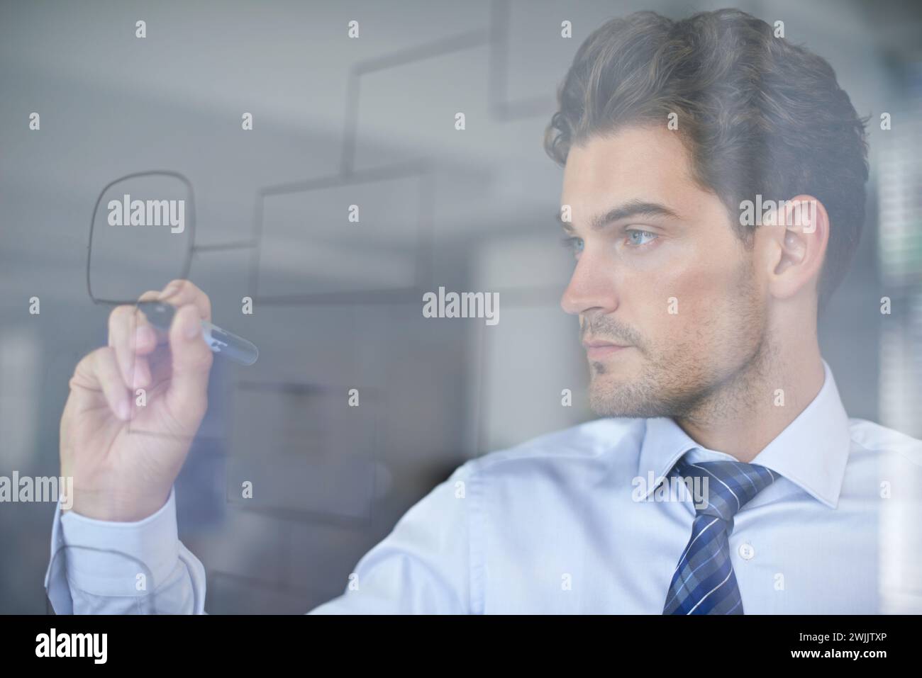 Professional man, mindmap and planning on glass wall for brainstorming ...