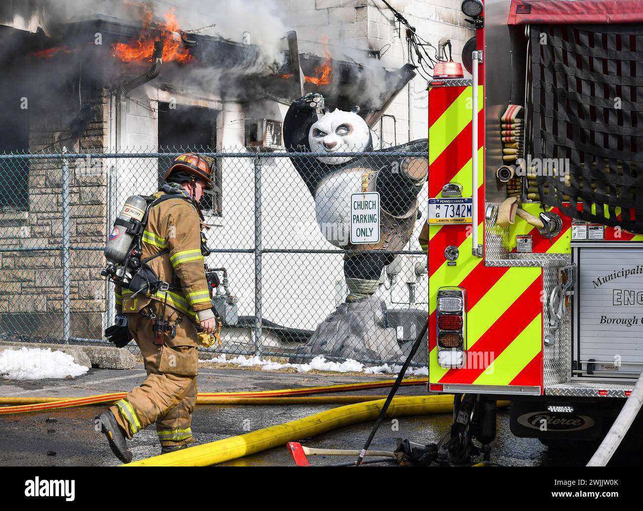 Edwardsville, United States. 15th Feb, 2024. A Firefighter walks past a ...