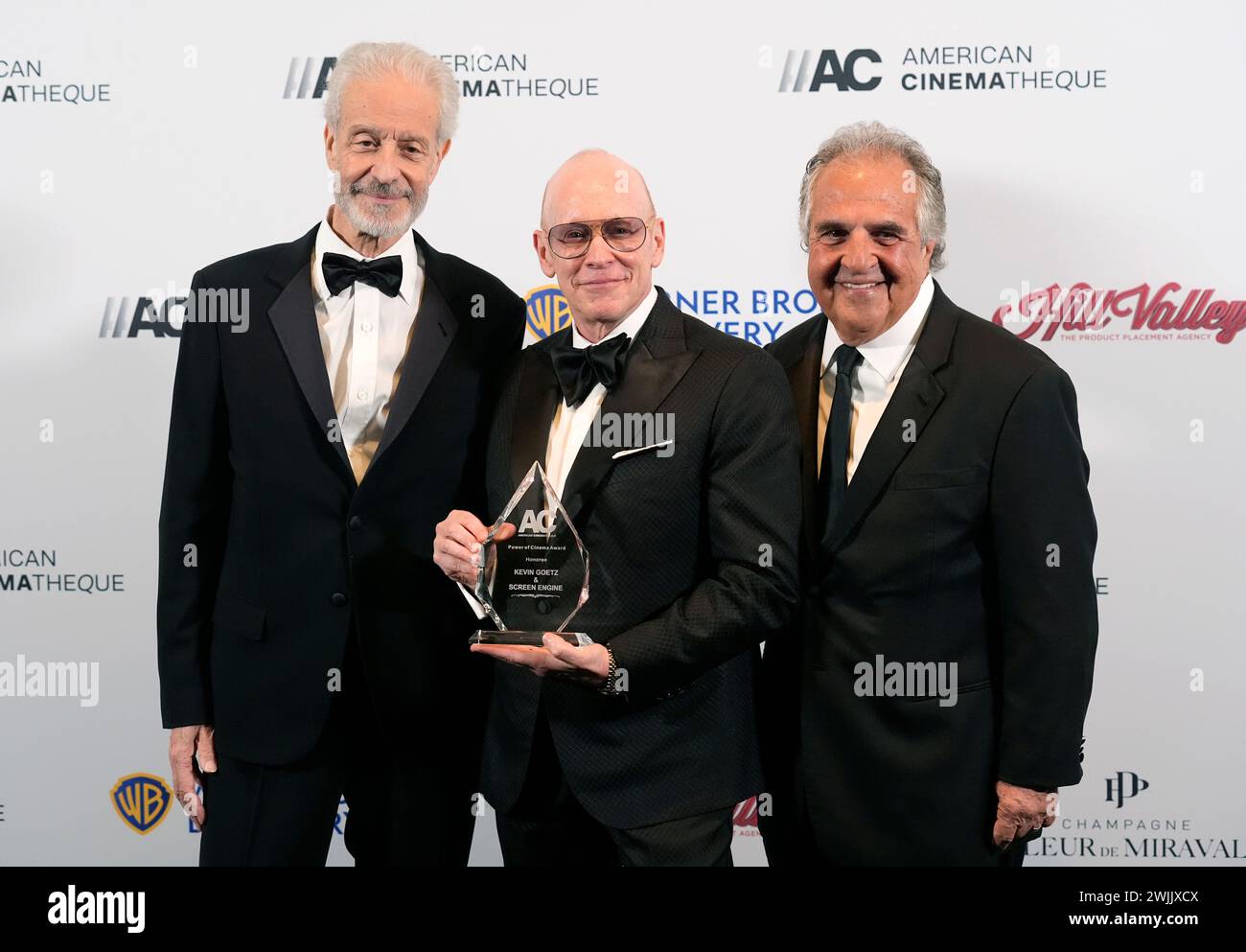 Power of Cinema Award recipient Kevin Goetz, center, poses with Rick ...