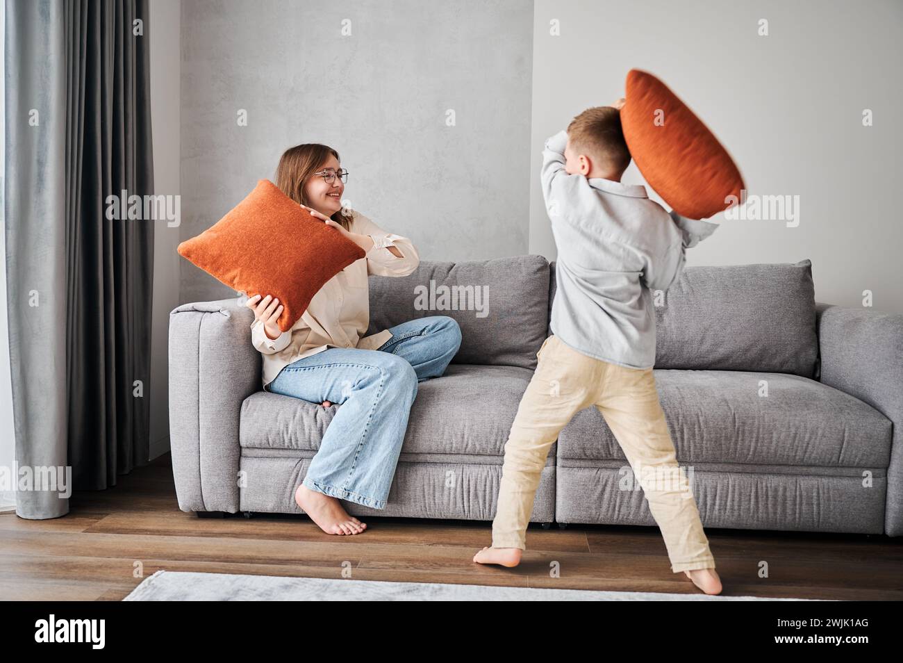 Brother sister play fighting on hi-res stock photography and images - Alamy
