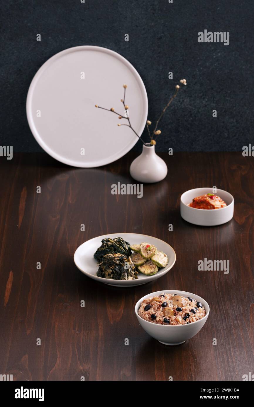 a table of dried greens and five grain rice Stock Photo - Alamy