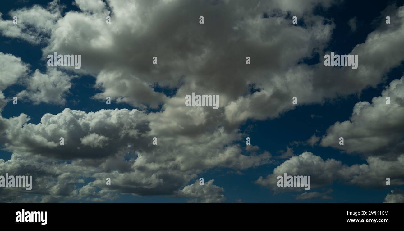 Tropical sunset. Beautiful sunset sky with clouds. Orange sunset, dark clouds in sky. Background ...