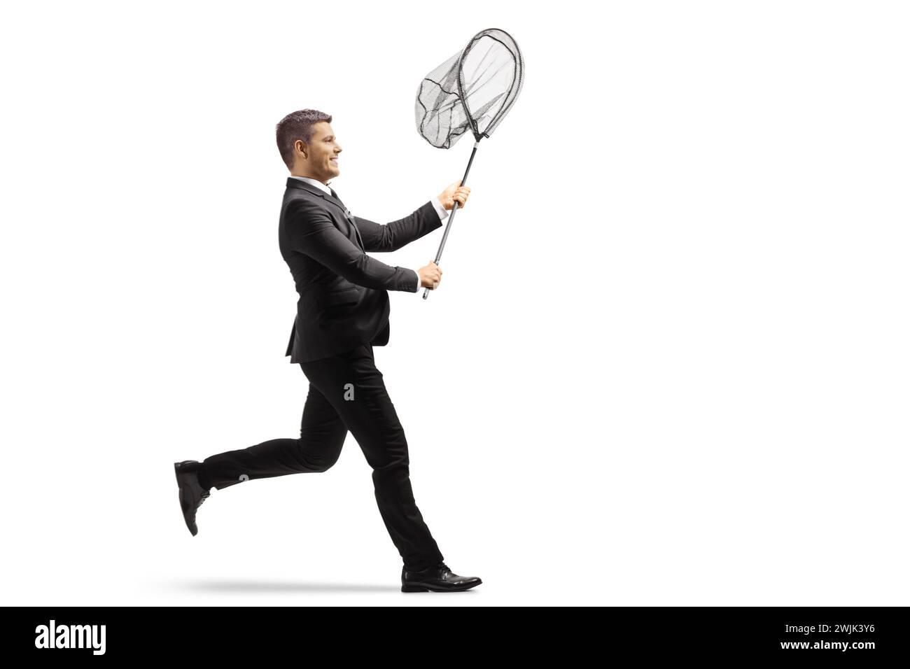 Businessman running and holding a catching net isolated on white ...