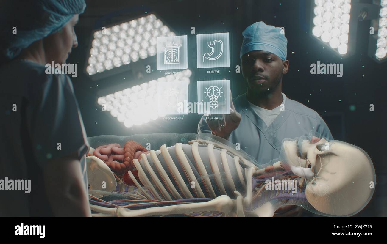 Diverse surgeons work in operating room. African American doctor talks ...