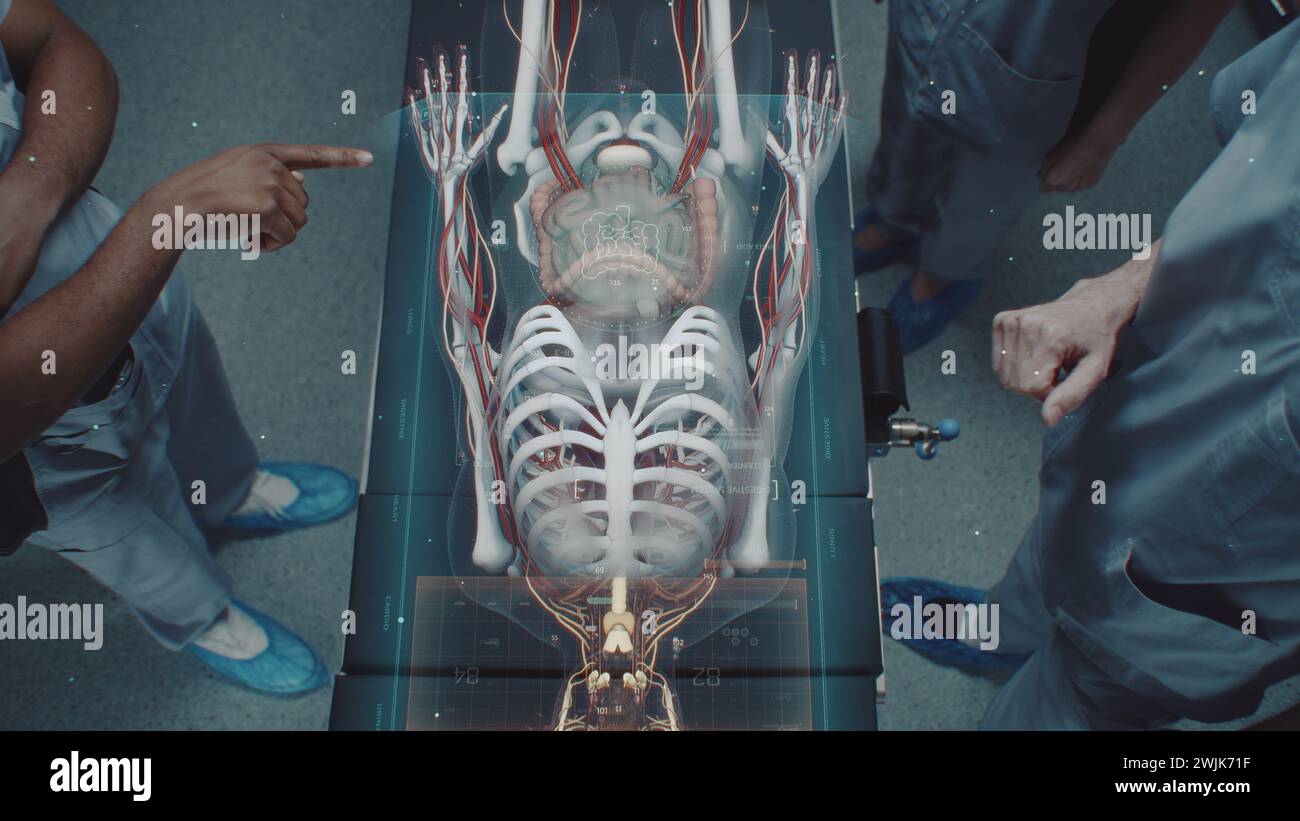 Multiethnic surgical team work in operating room using futuristic ...