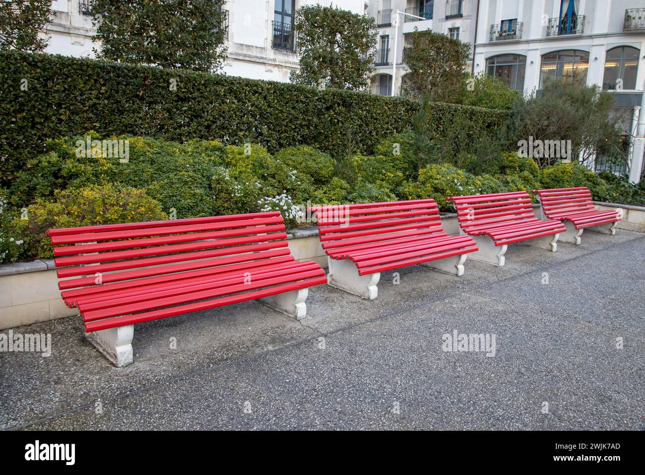 Red wooden benches hi-res stock photography and images - Alamy