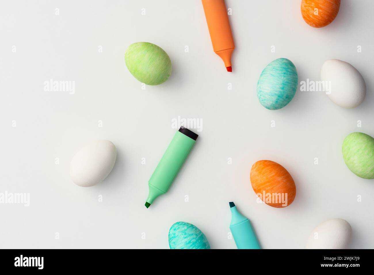 Hand painted colourful easter eggs with felt tip pens on white ...