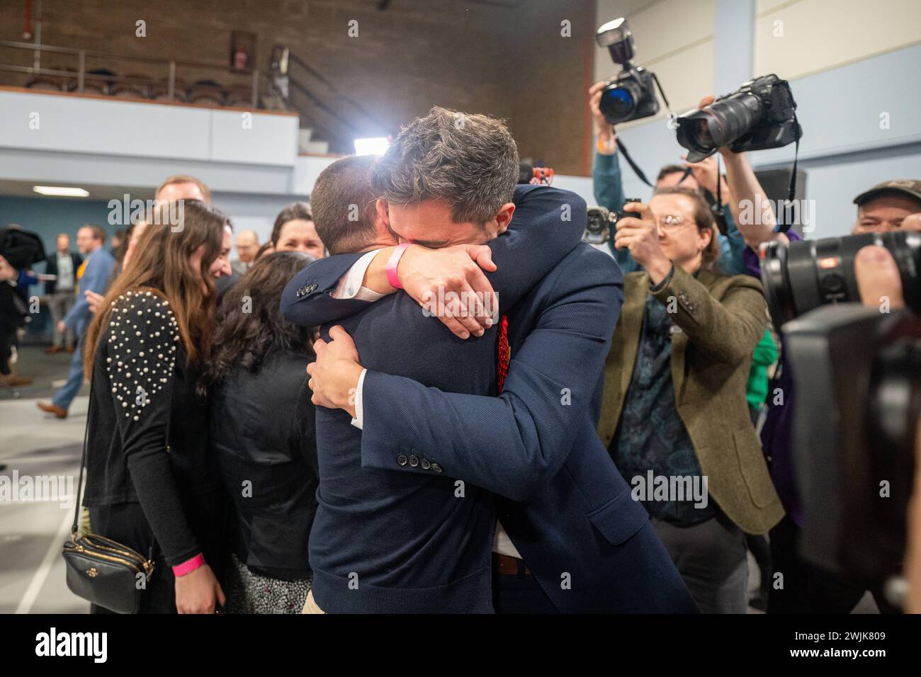 Labour candidate Damien Egan hugs his husband Yossi Felberbaum after ...