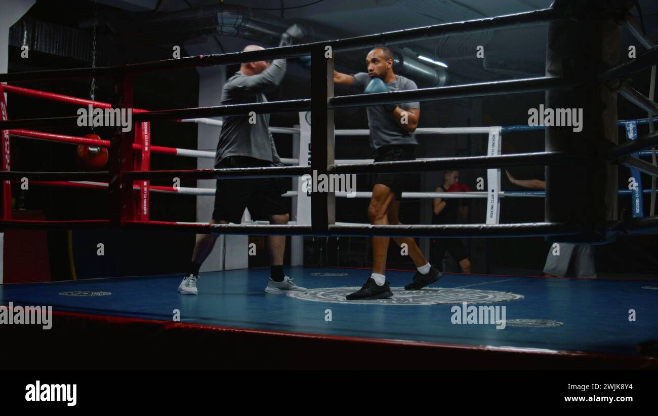African American fighter exercises and prepares for fighting match with ...