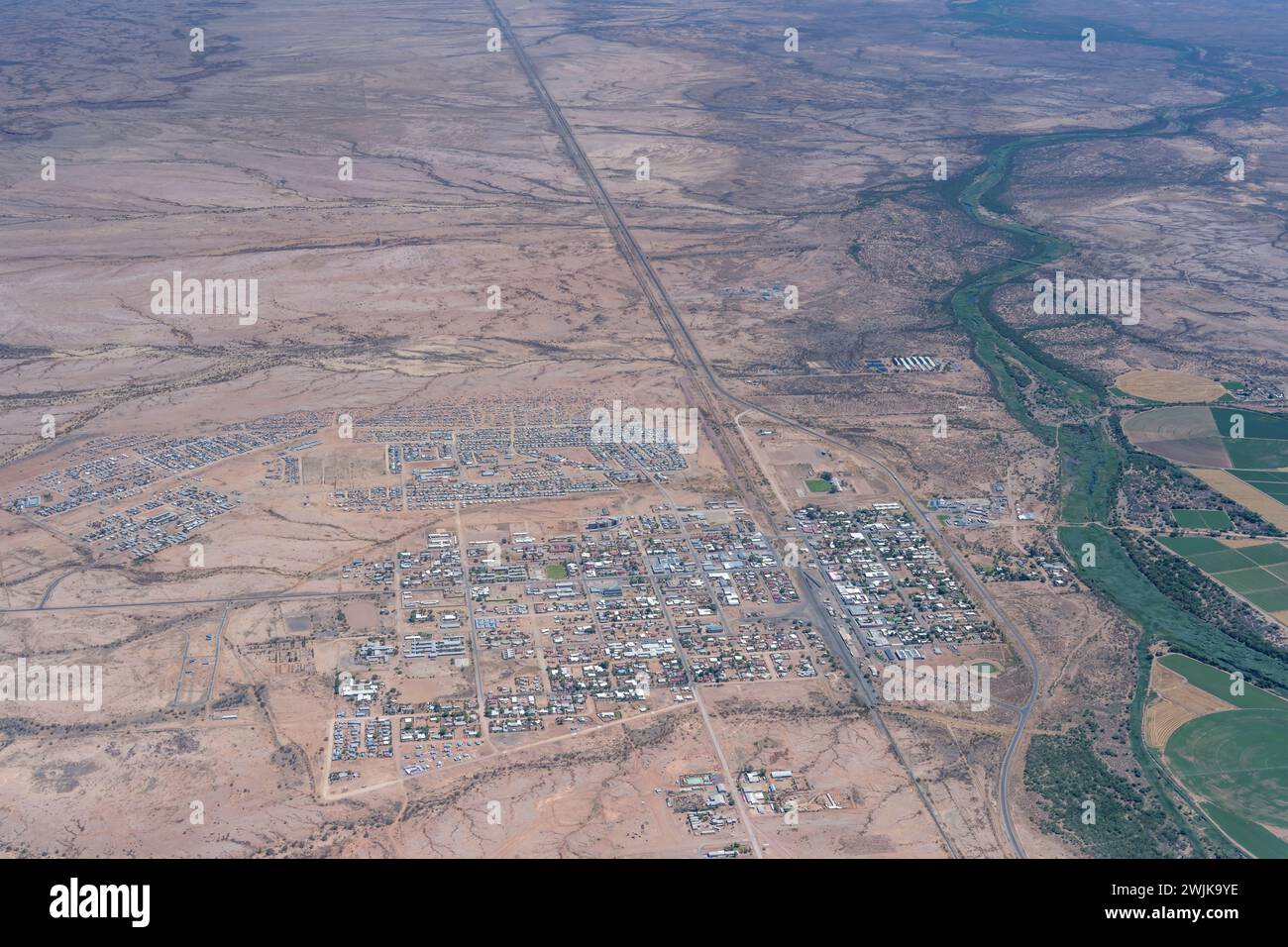 aerial cityscape with Mariental town near Fish river in desert, shot ...