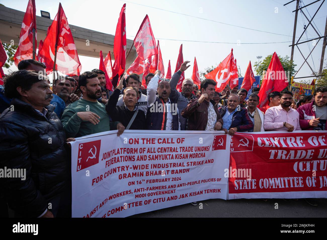 Members of Centre of India Trade Unions (CITU) shout slogans in support ...
