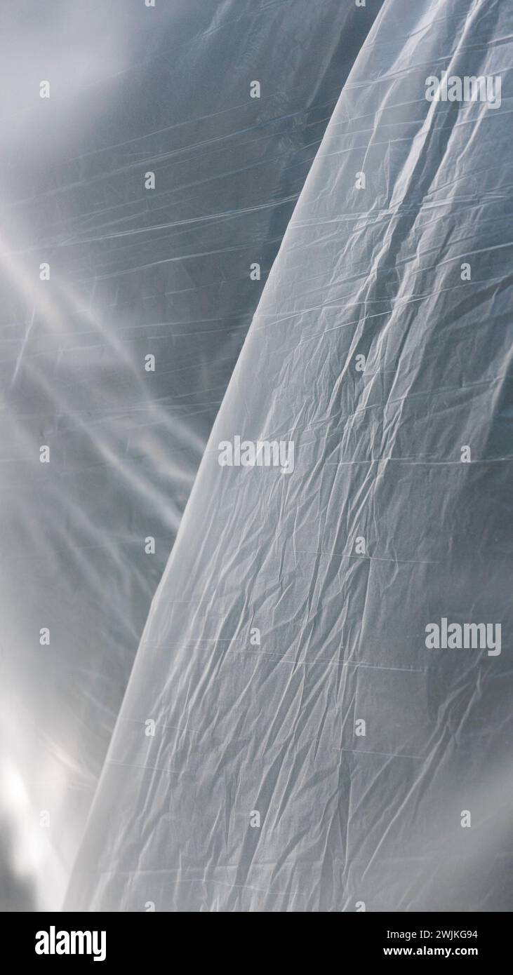 Transparent plastic sheet wrinkles background Stock Photo - Alamy