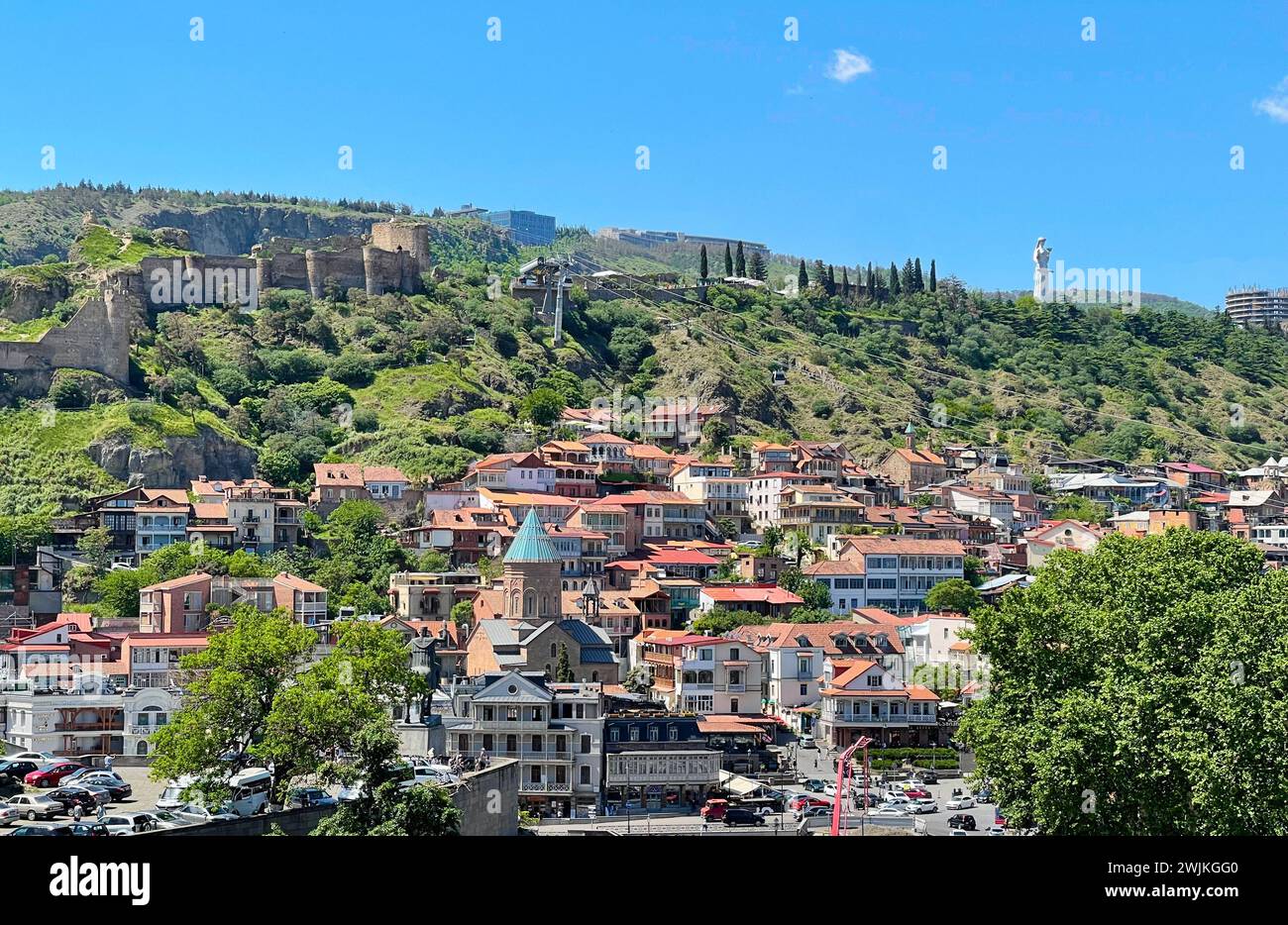 Cute landscape of Tbilisi with old city on the background of sky and ...