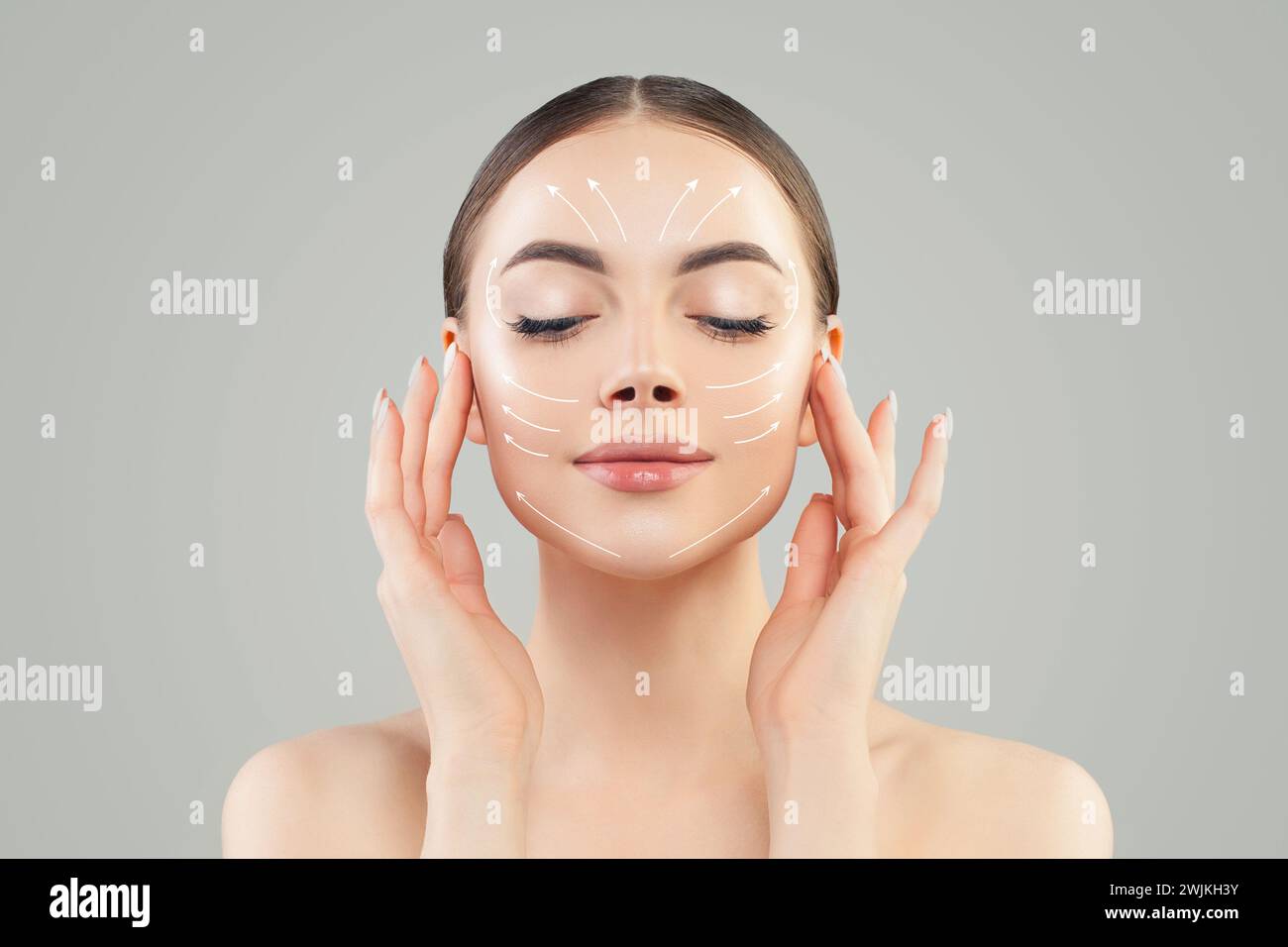 Massage facial lines on beautiful female face close up Stock Photo - Alamy