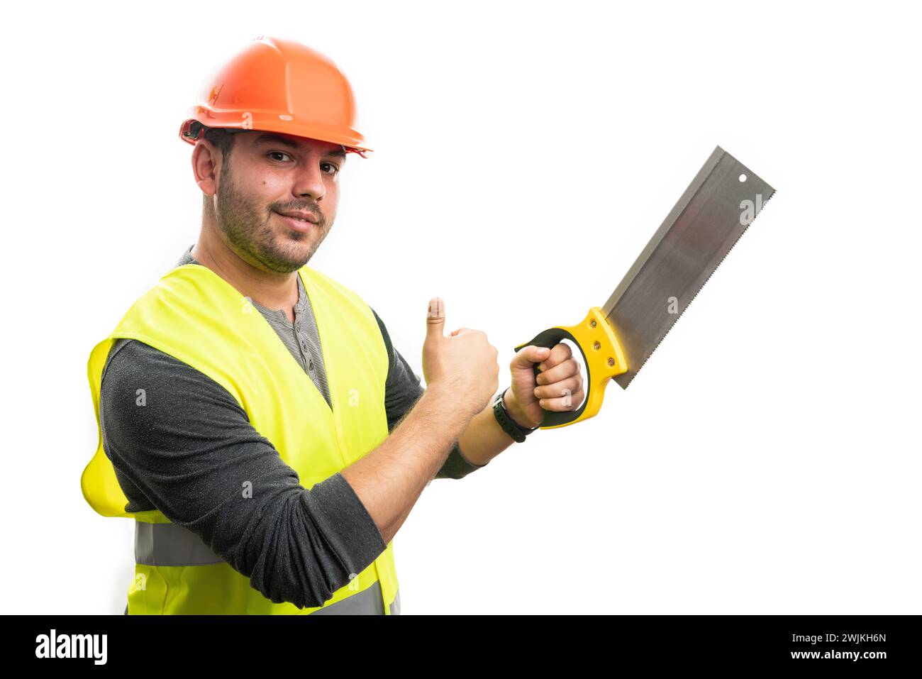 Builder man with cheerful smiling friendly expression holding lumber ...