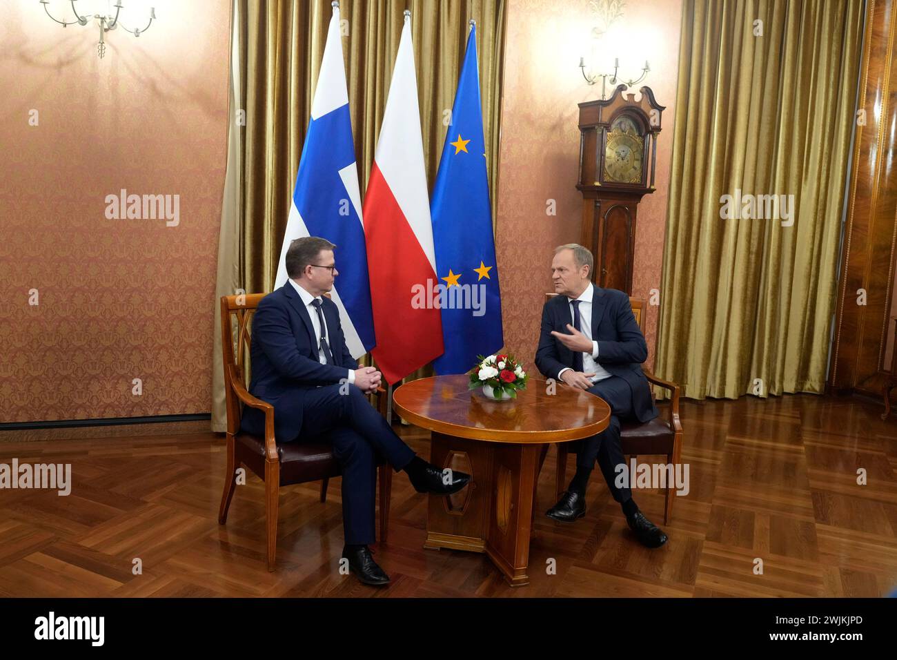Polish Prime Minister Donald Tusk, right, sits with Finnish Prime Minister Petteri Orpo, during ...
