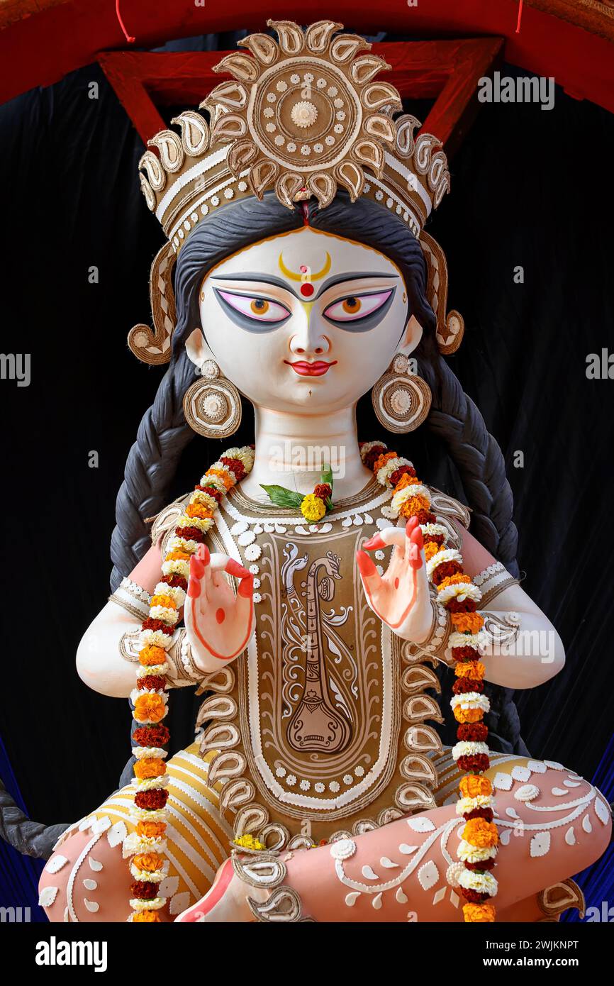 Idol of Goddess Devi Saraswati at a decorated puja pandal in Kolkata ...