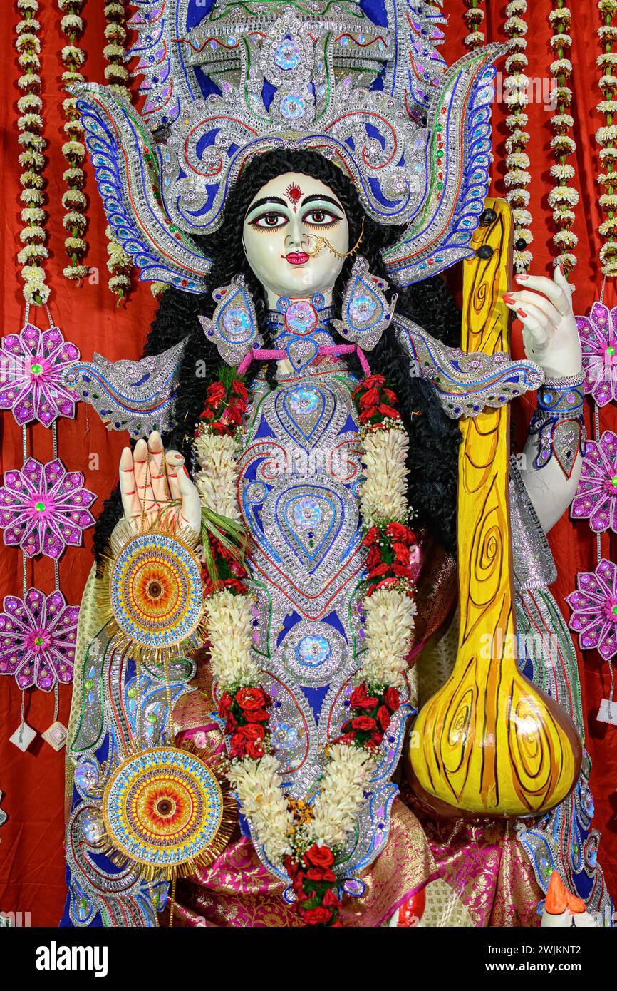 Idol of Goddess Devi Saraswati at a decorated puja pandal in Kolkata ...